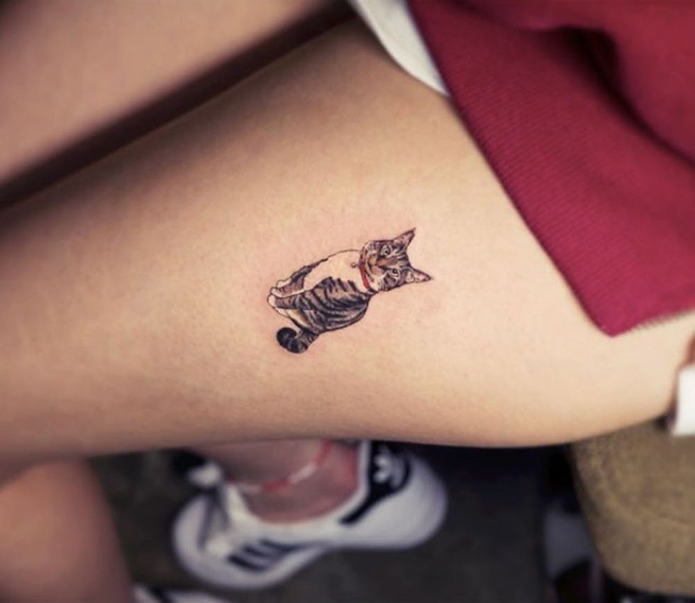 12 Pretty and Meaningful Thigh Tattoos - Brit + Co