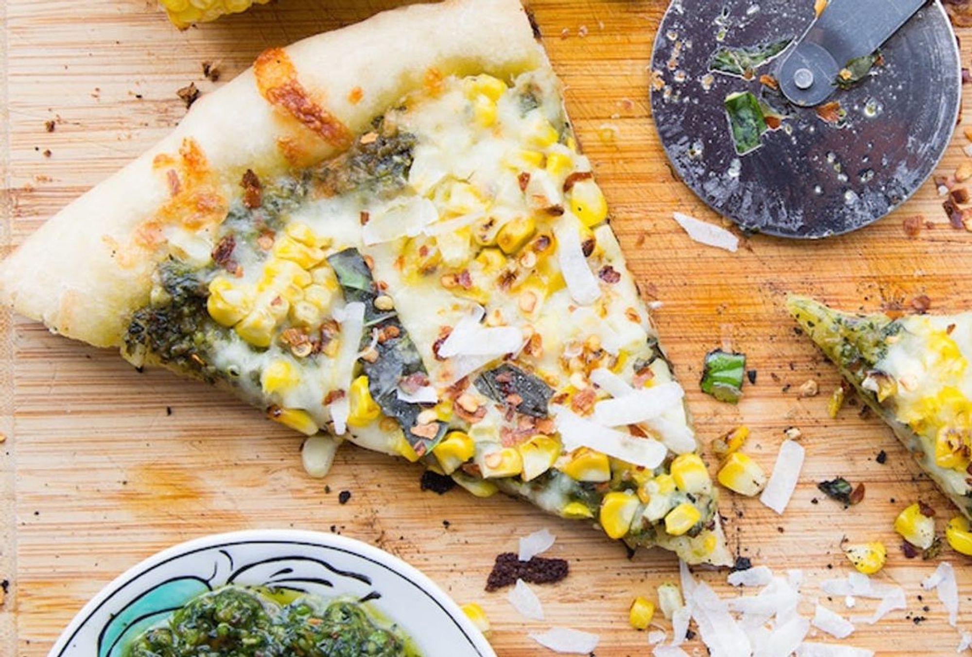 Fulfill Your Pizza Dreams With Grilled Kale Pesto + Corn Pizza - Brit + Co