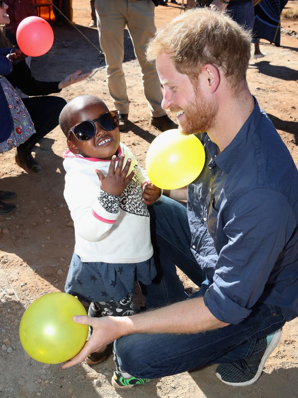 35 Photos of Prince Harry and Meghan Markle’s Cutest Moments With Kids ...