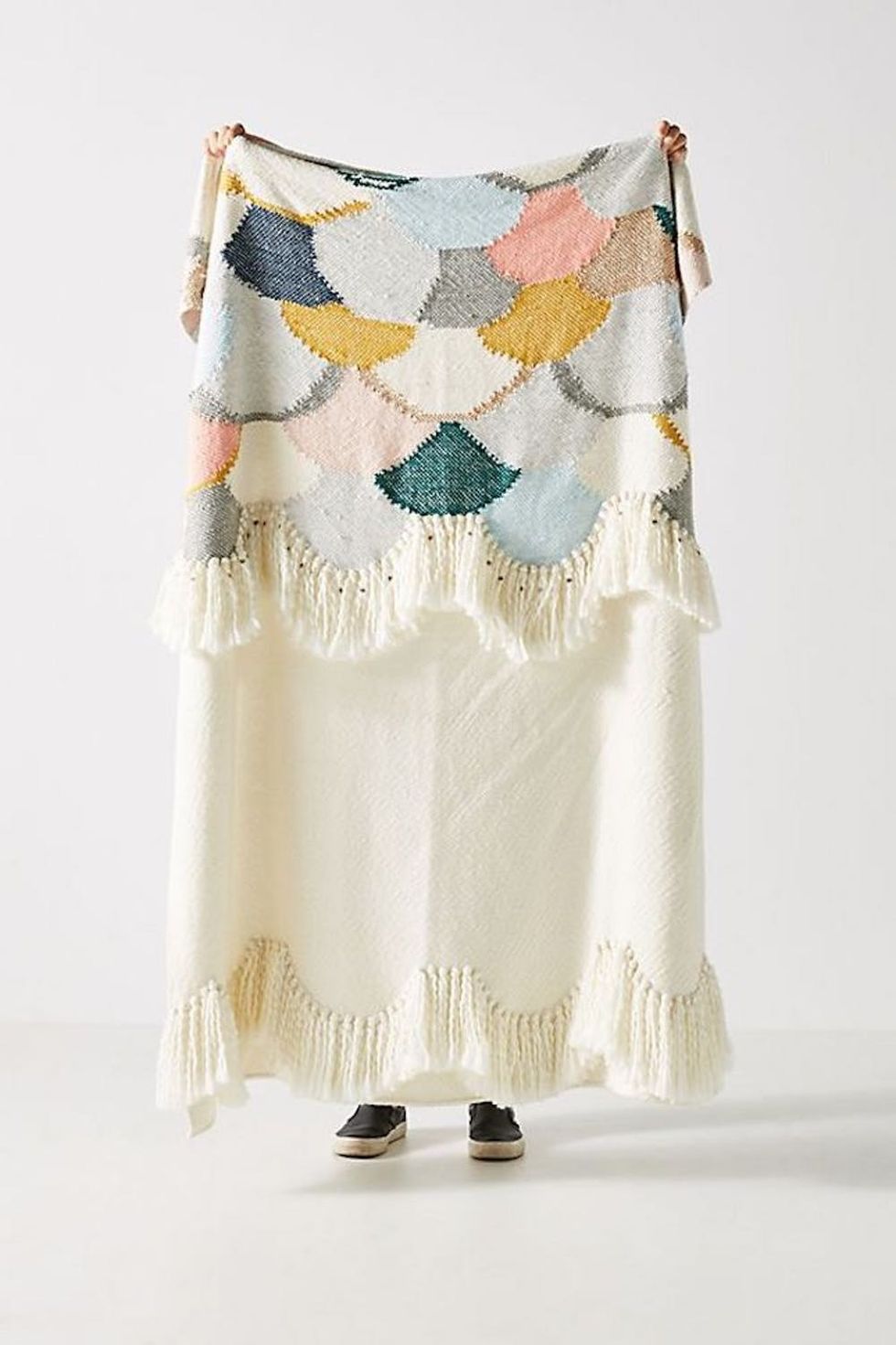 14 Cozy Throw Blankets to Snuggle Up With This Winter - Brit + Co