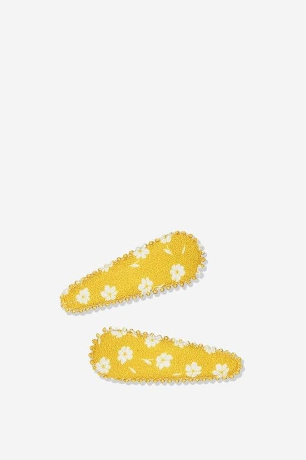 19 Chic Snap Clips to Stylishly Tame Your Mane - Brit + Co