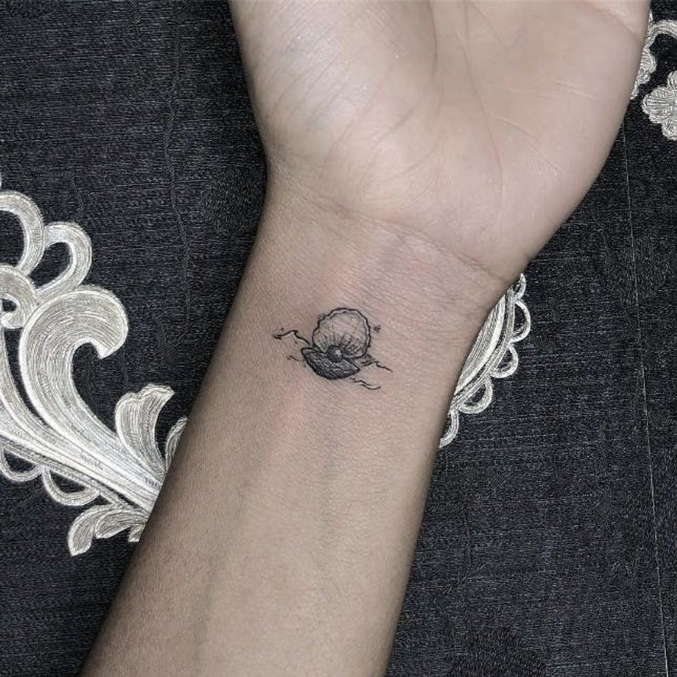 20 Tiny Wrist Tattoos - Brit + Co