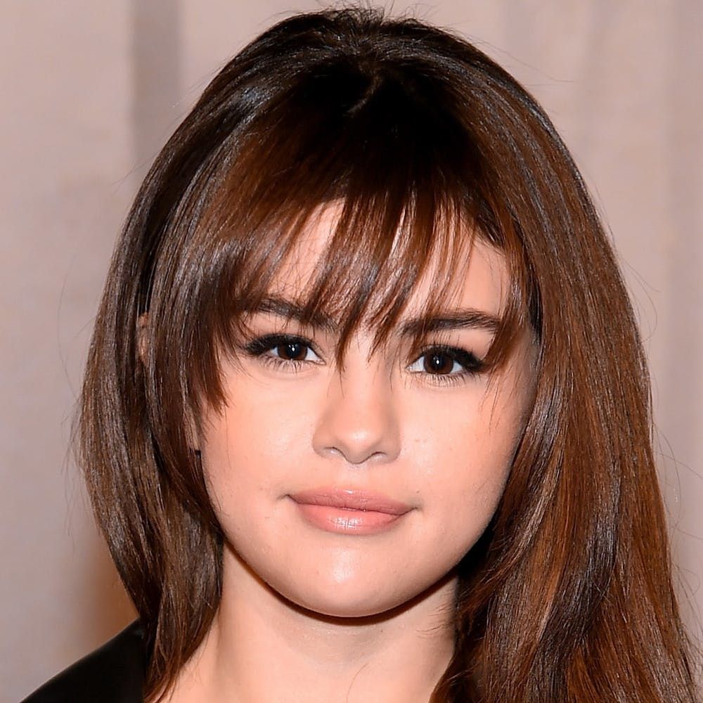 Selena Gomez Layered Hair With Bangs