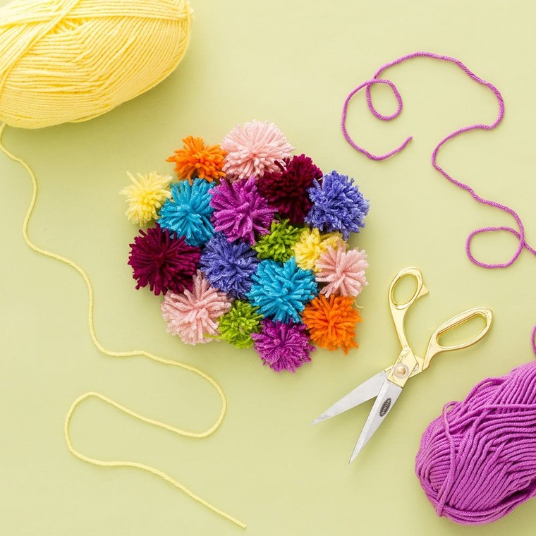 Yarn Pom Poms On Backpack