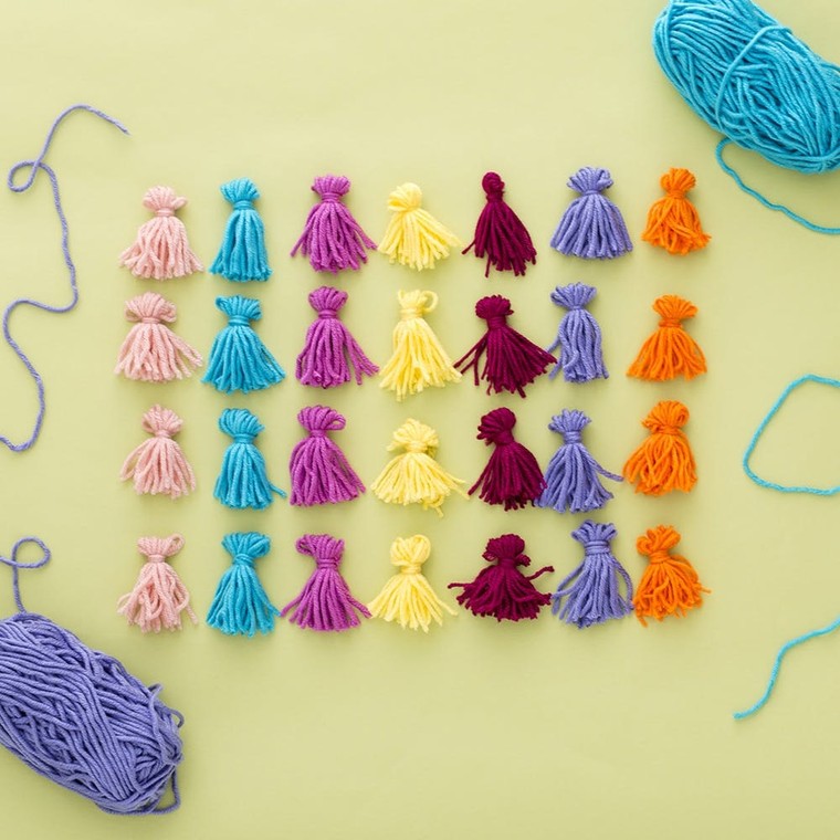 Yarn Pom Poms On Backpack