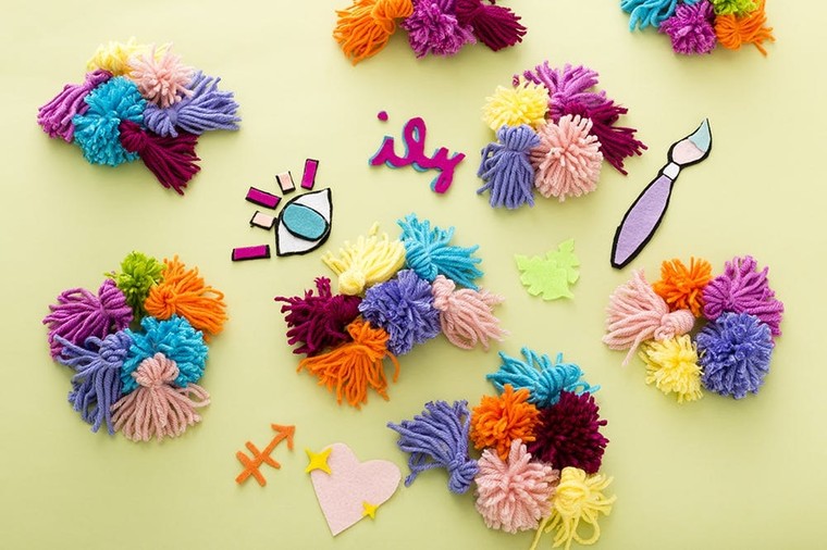 Yarn Pom Poms On Backpack