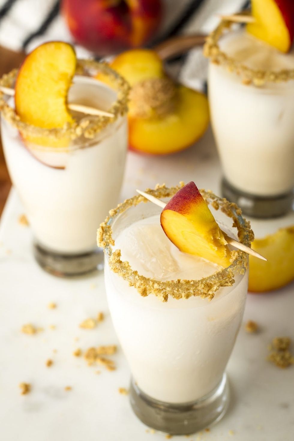 10 Peach Cocktail Recipes Your Guest Will Love - Brit + Co - Brit + Co